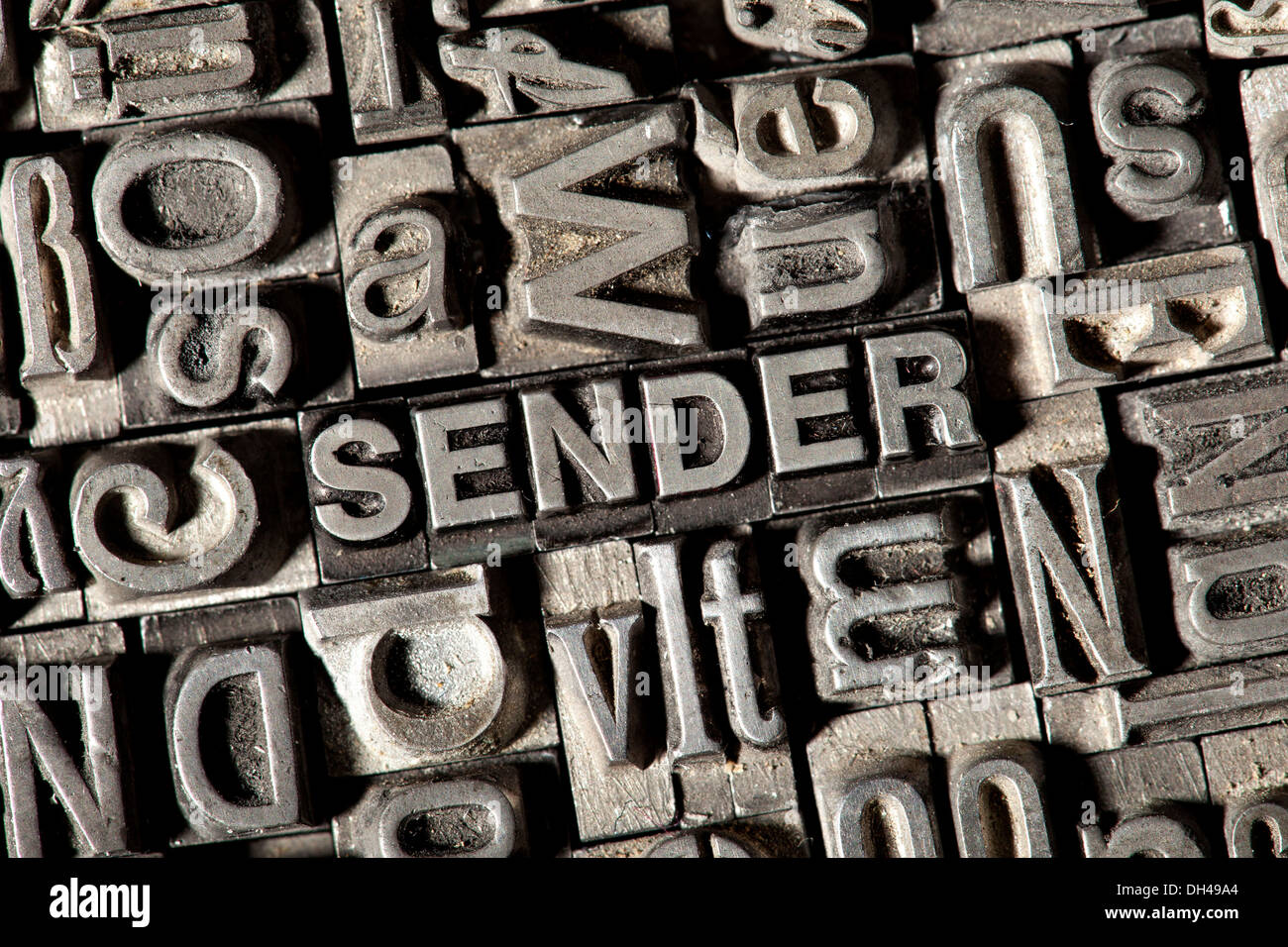 Old lead letters forming the word SENDER Stock Photo - Alamy