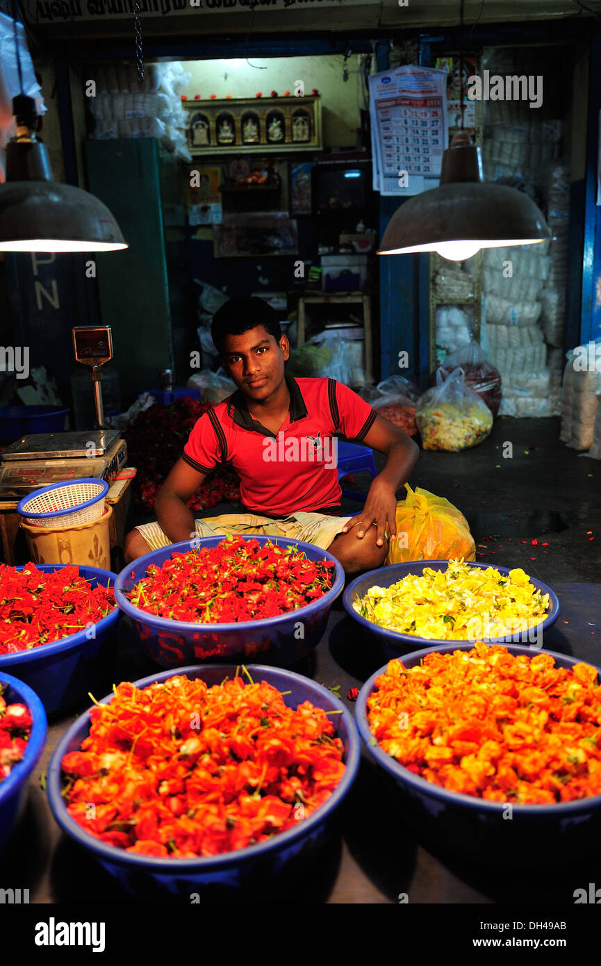 Boy selling flowers shop Koyambedu Flower Market Tamil Nadu India Asia ...