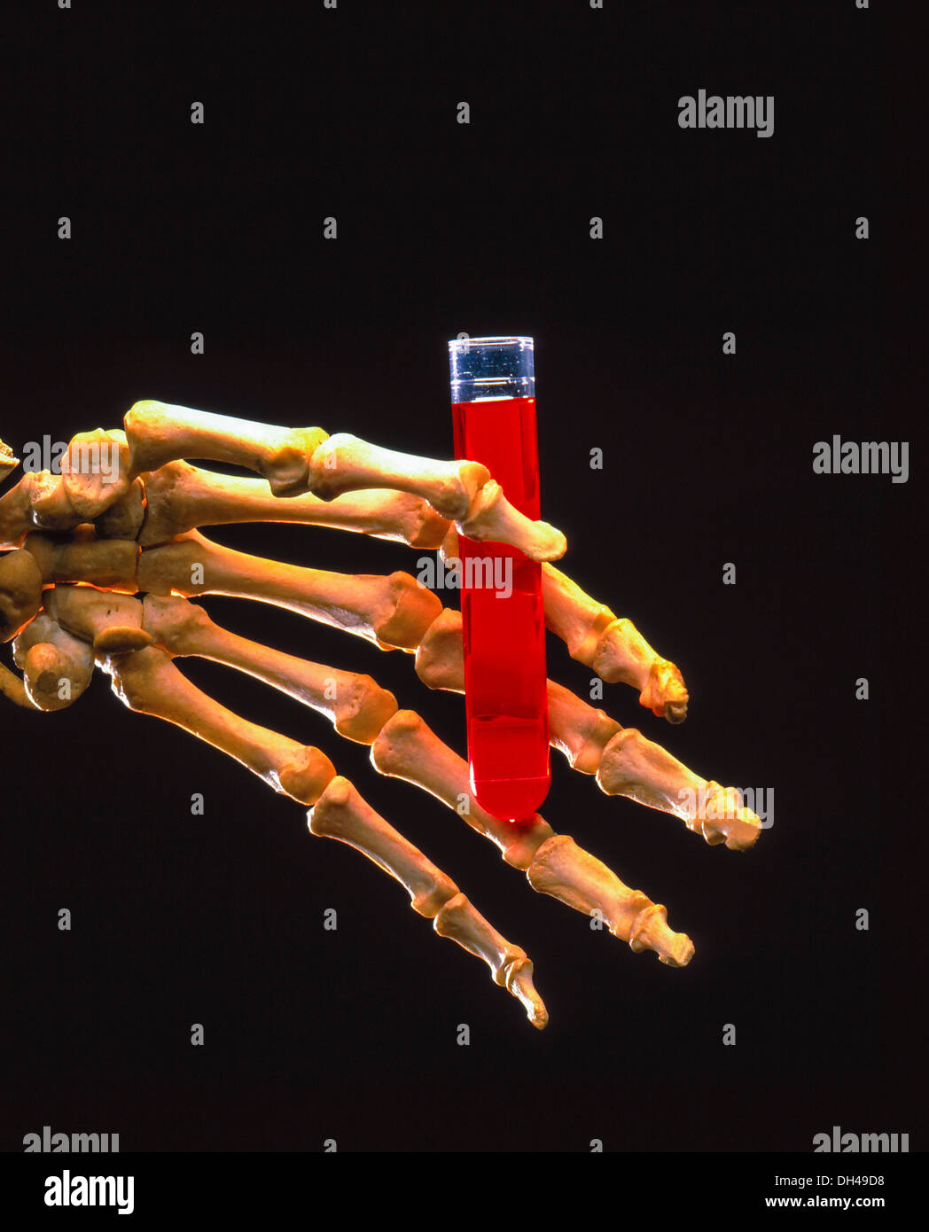 Skeleton hand holding test tube hi-res stock photography and images - Alamy