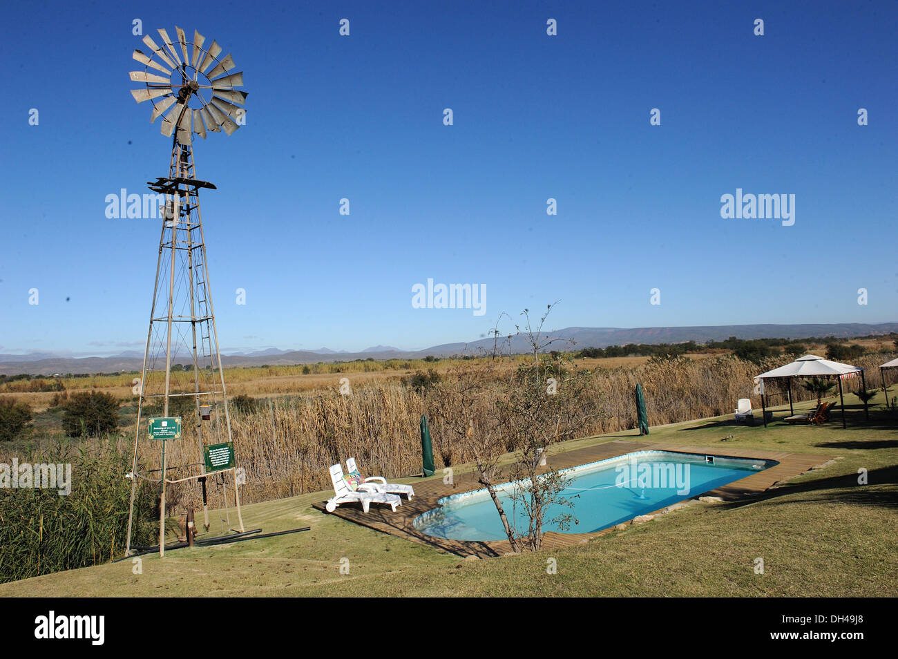 windmill and swimming pool south africa Stock Photo - Alamy