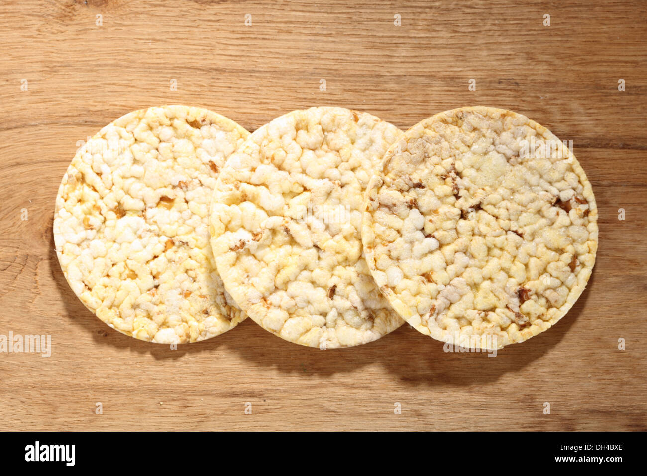 Healthy food nutrition. Thin round corn cakes on wooden background ...