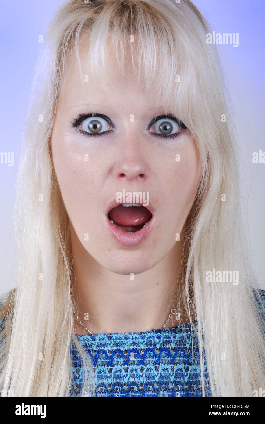 Beautiful surprised woman Stock Photo - Alamy