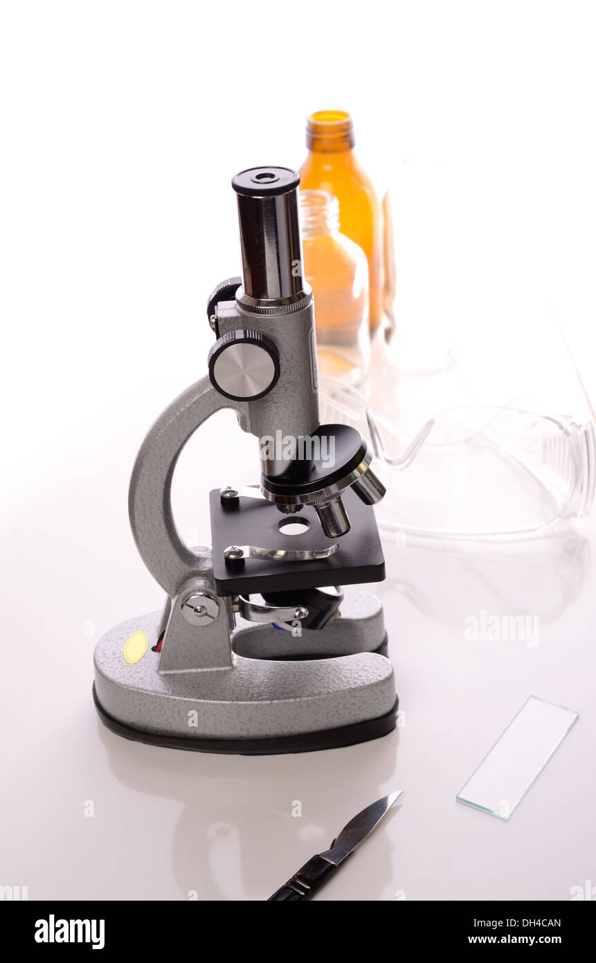 Microscope with laboratory equipment Stock Photo - Alamy