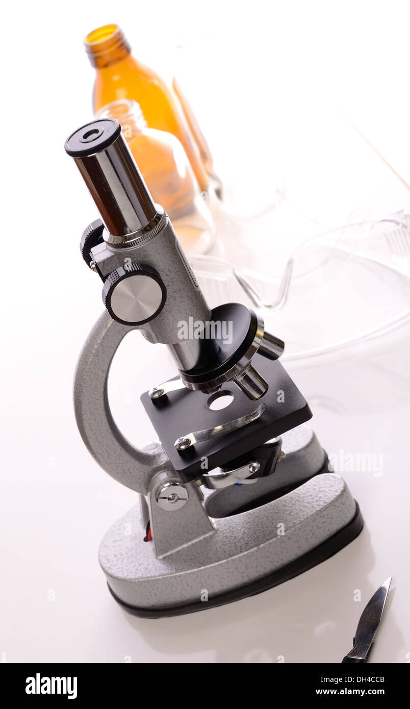 Microscope with laboratory equipment Stock Photo - Alamy