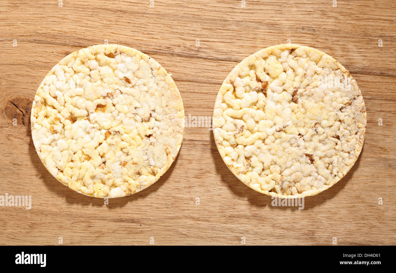 Healthy food nutrition. Thin round corn cakes on wooden background ...