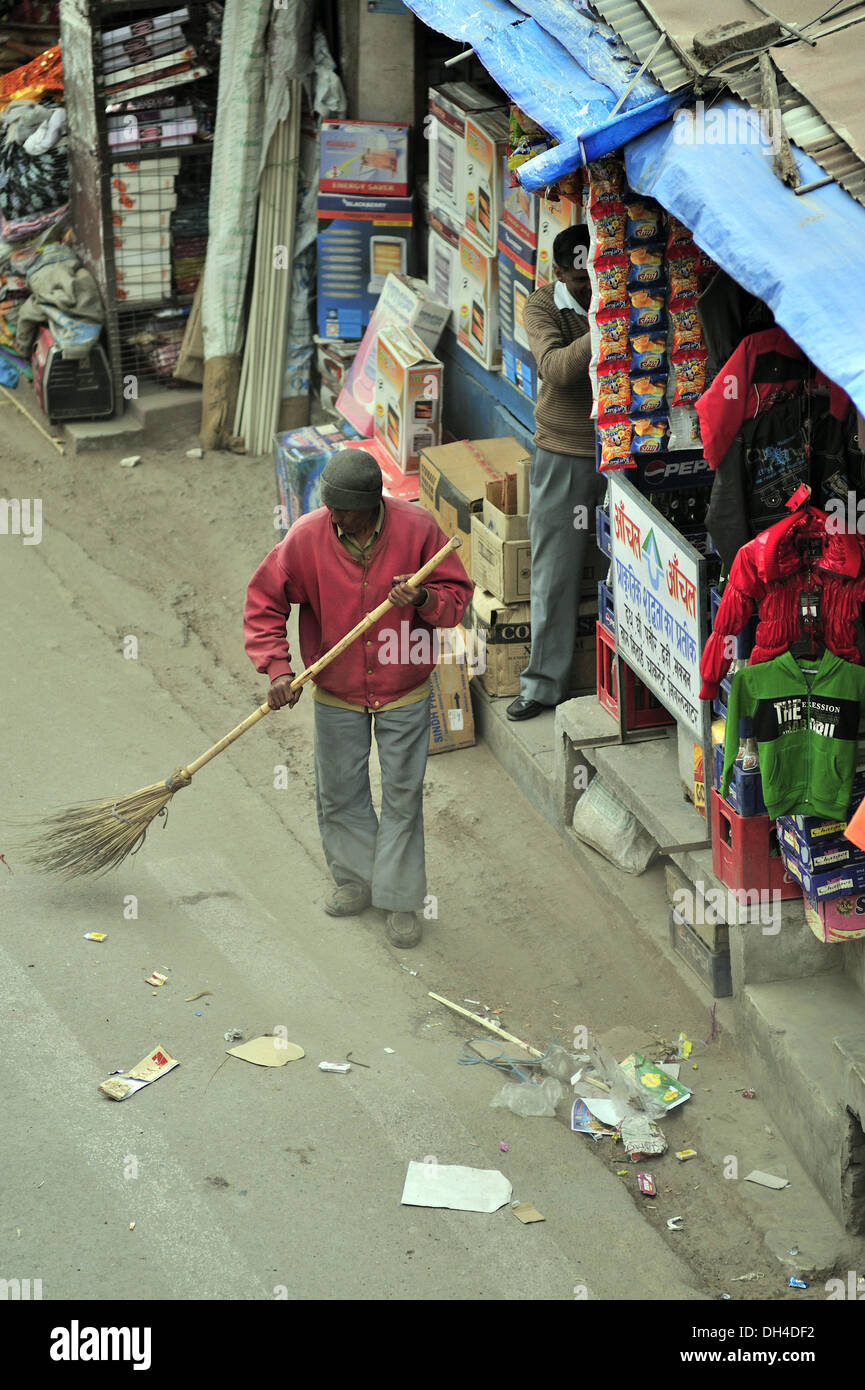 Sweeper cleaning the road at ranikhet almora uttarakhand India Asia ...