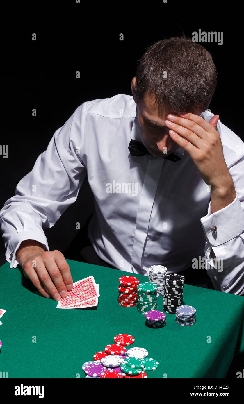 Gentleman in white shirt, playing cards Stock Photo - Alamy