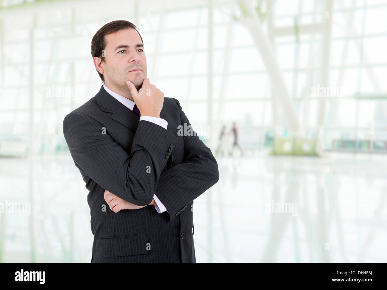 young business man thinking at the office Stock Photo - Alamy