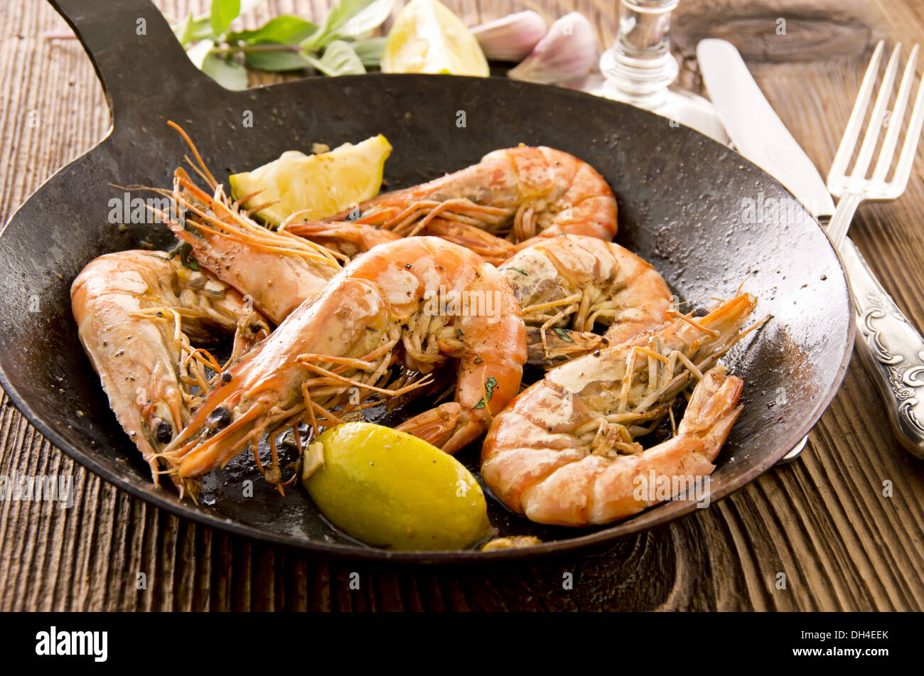 fried gambas with lemon Stock Photo - Alamy