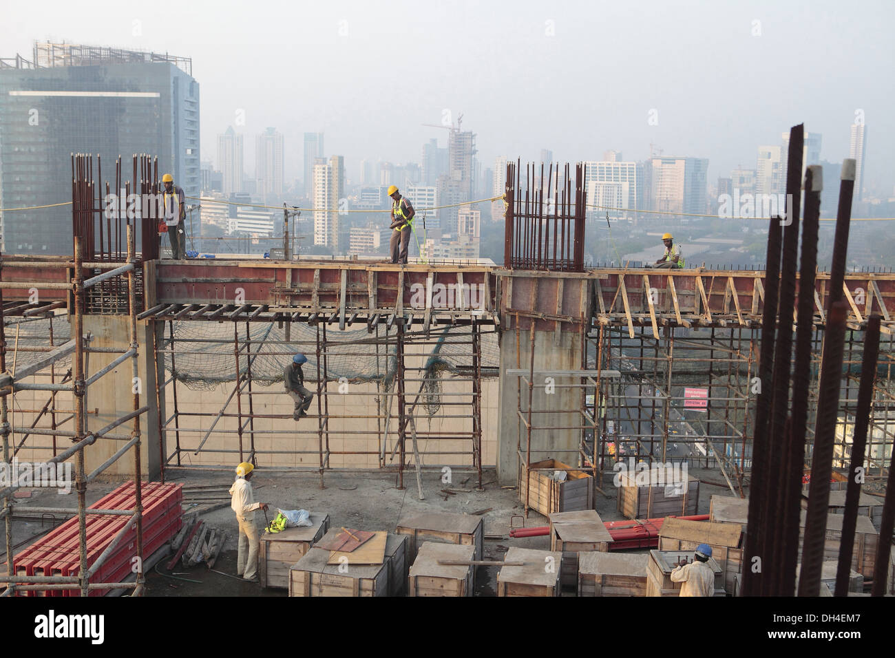 Building under construction, workers working on highrise, lower parel ...