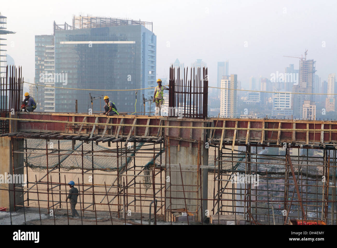 Building under construction, workers working on highrise, lower parel ...