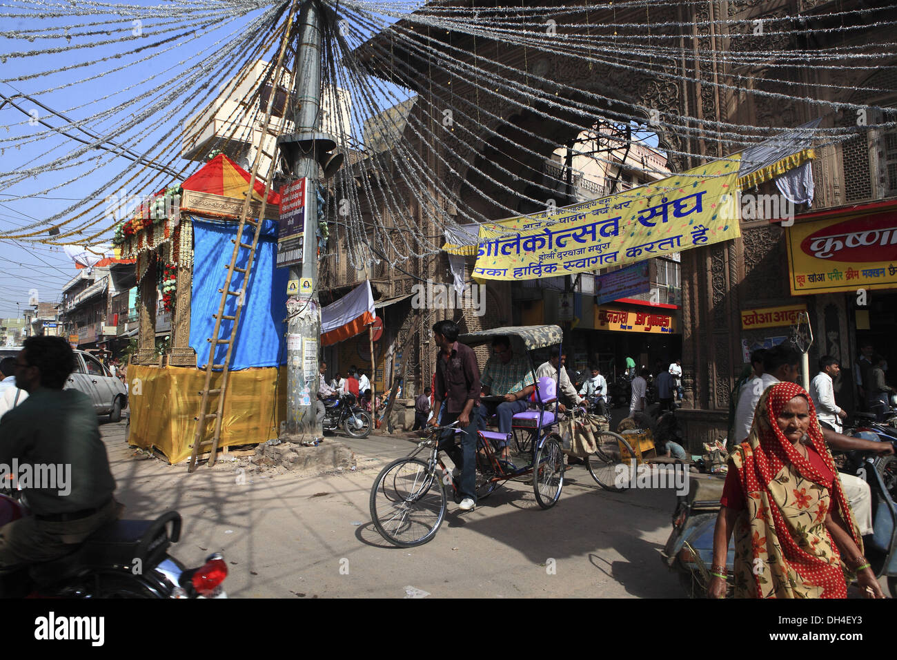 Street scene rickshaw ladder wires ; Mathura ; Uttar Pradesh ; India ...