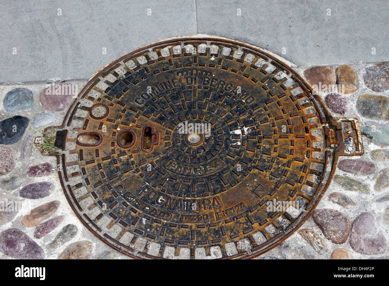 This image shows a drain cover in Piazza Duomo, Bergamo, Italy Stock ...