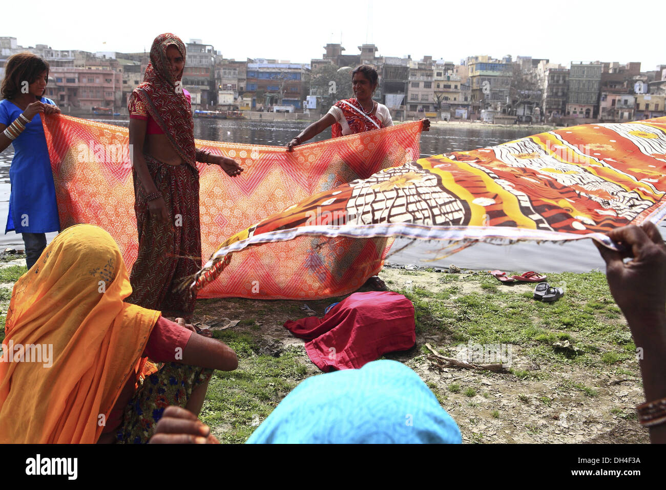 Women drying saree hi-res stock photography and images - Alamy