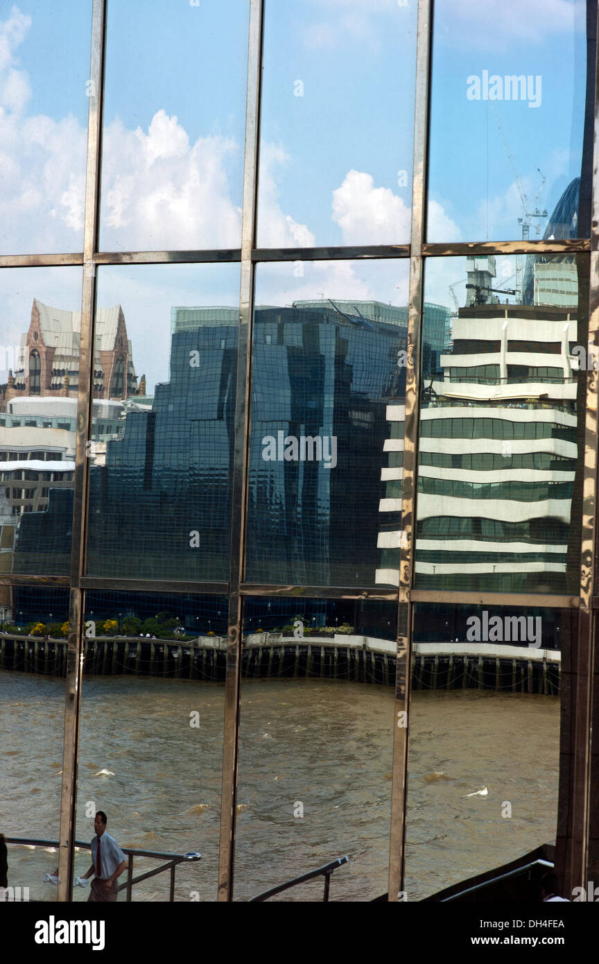 London buildings reflected in a glass window Stock Photo - Alamy