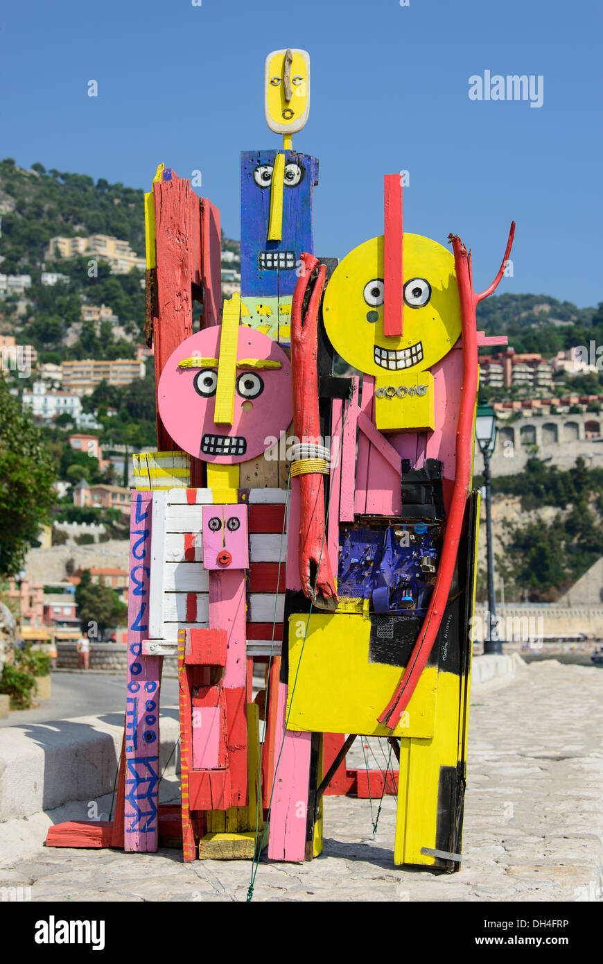 A brightly coloured sculpture made from driftwood and other ...