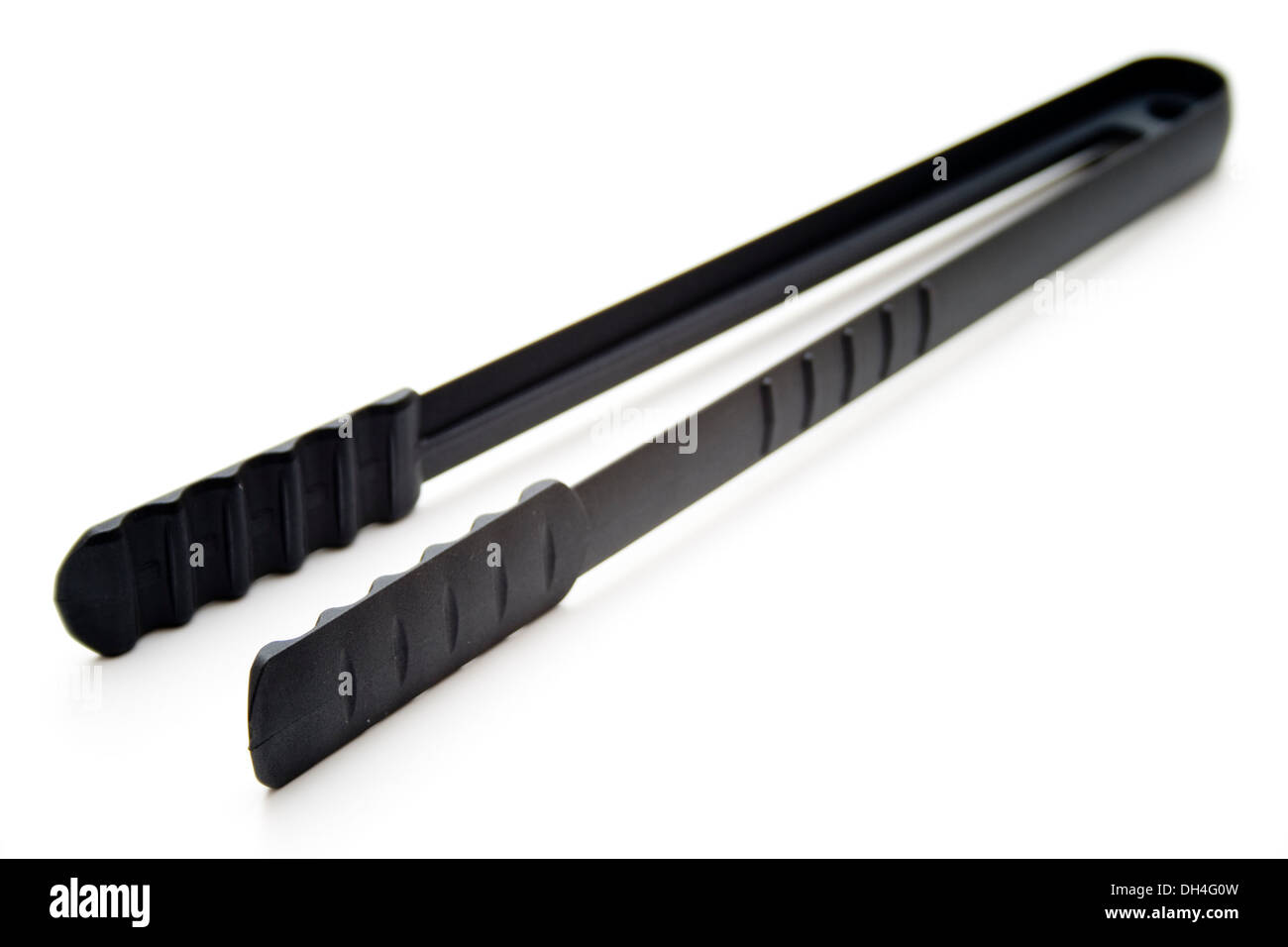 Grill tongs Cut Out Stock Images & Pictures - Alamy