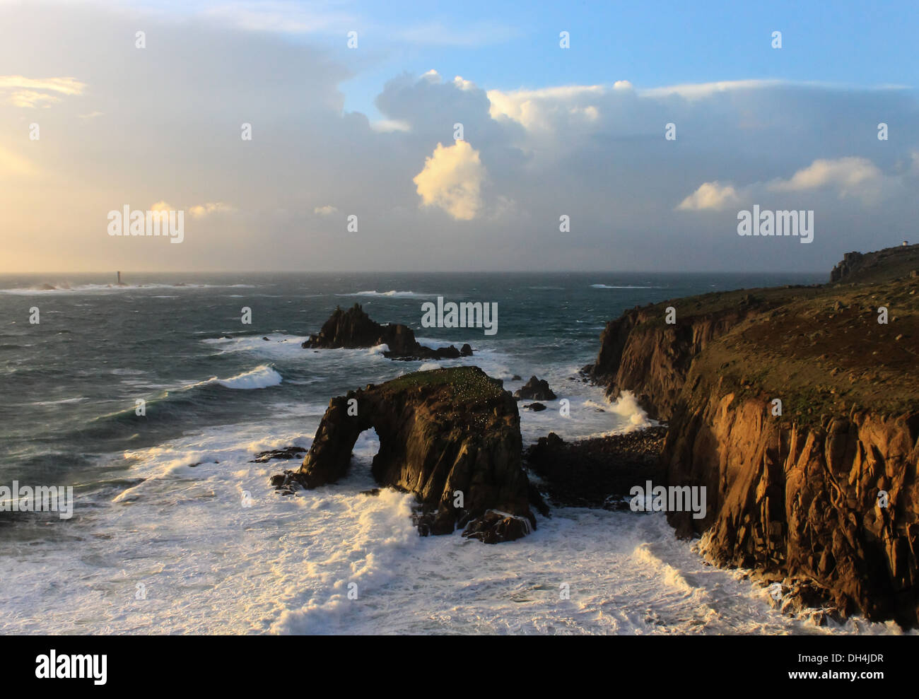 Sunset and rough sea at Lands End, Cornwall, UK Stock Photo - Alamy