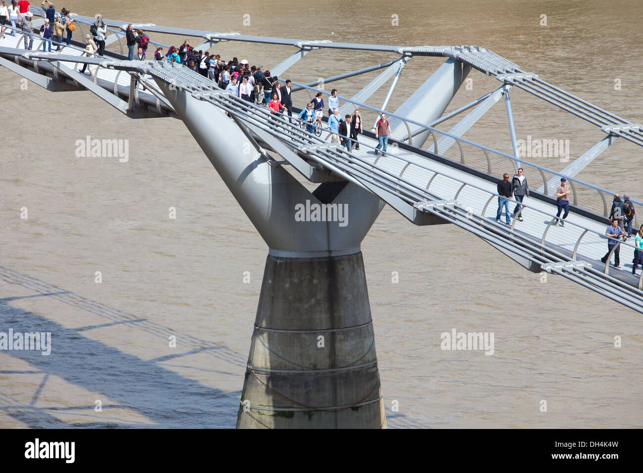 People walk over the Millennium Bridge London UK Stock Photo - Alamy