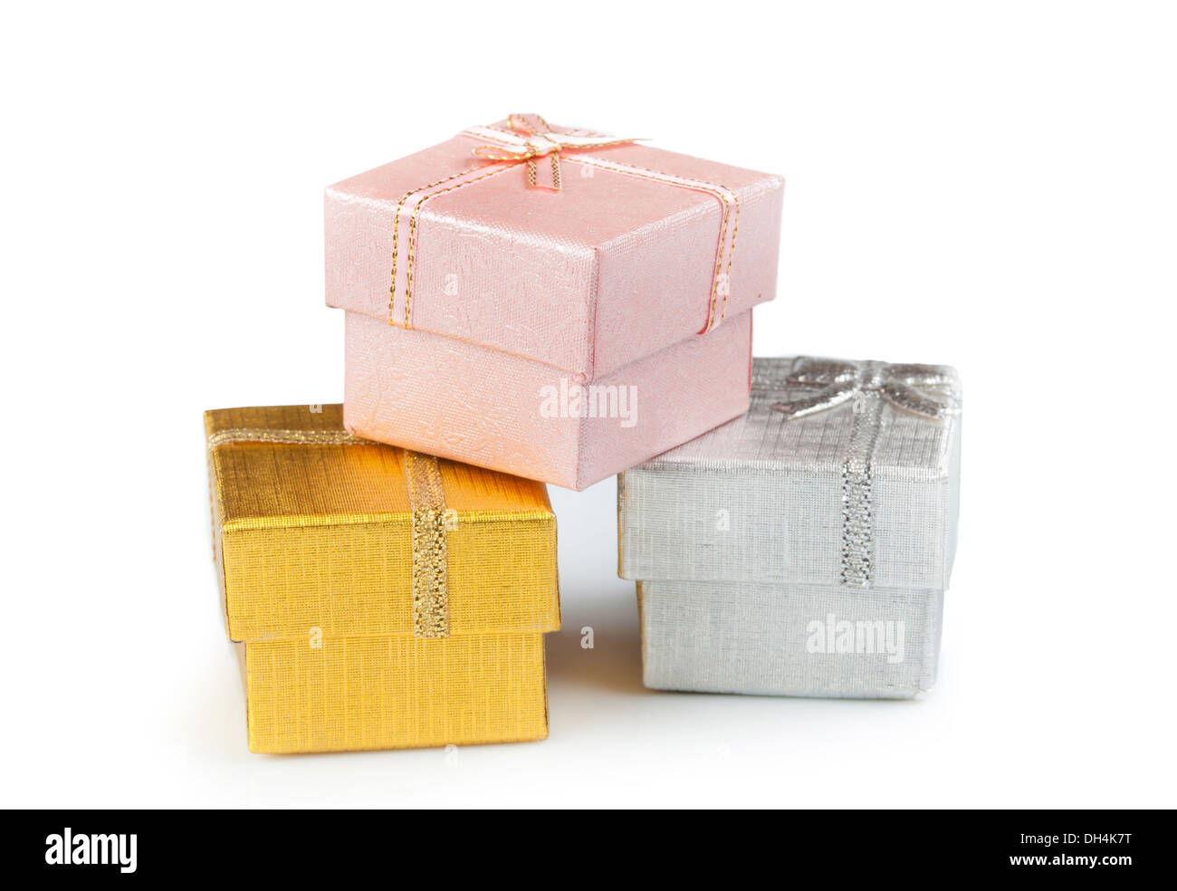 Three gift boxes isolated on white background Stock Photo - Alamy
