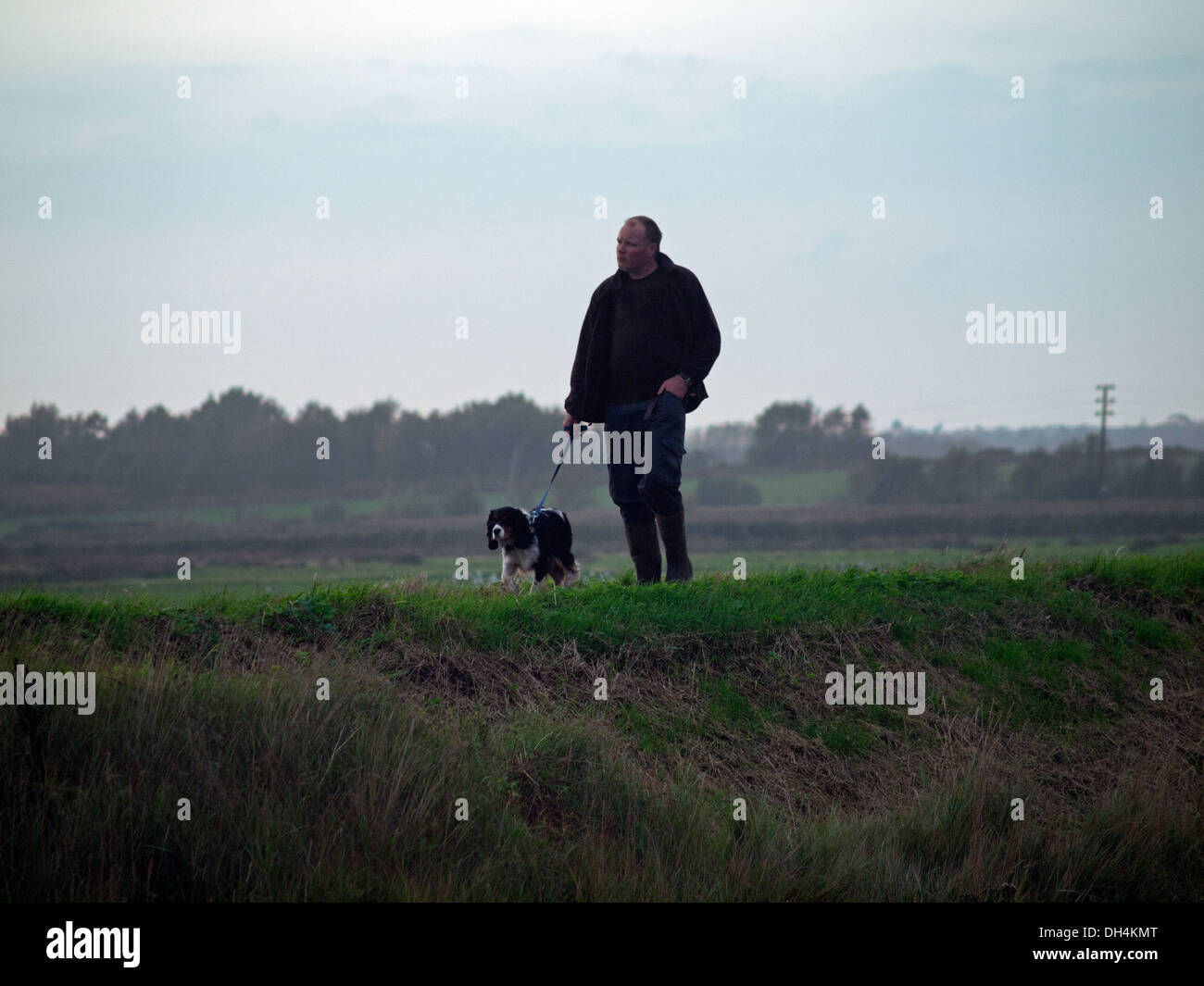 Man walking dog countryside hi-res stock photography and images - Alamy