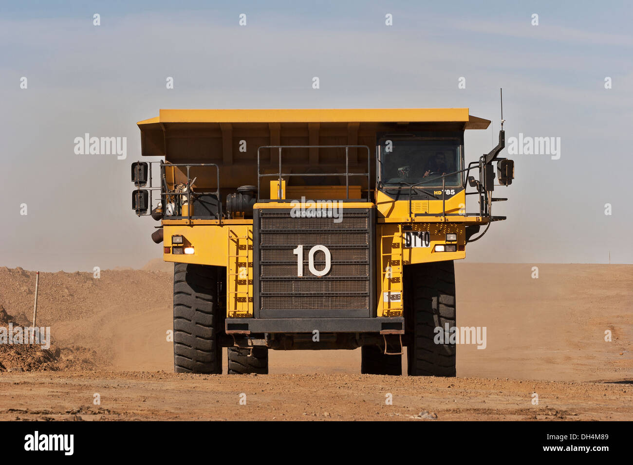 Large empty dump vehicle entering pit hi-res stock photography and ...