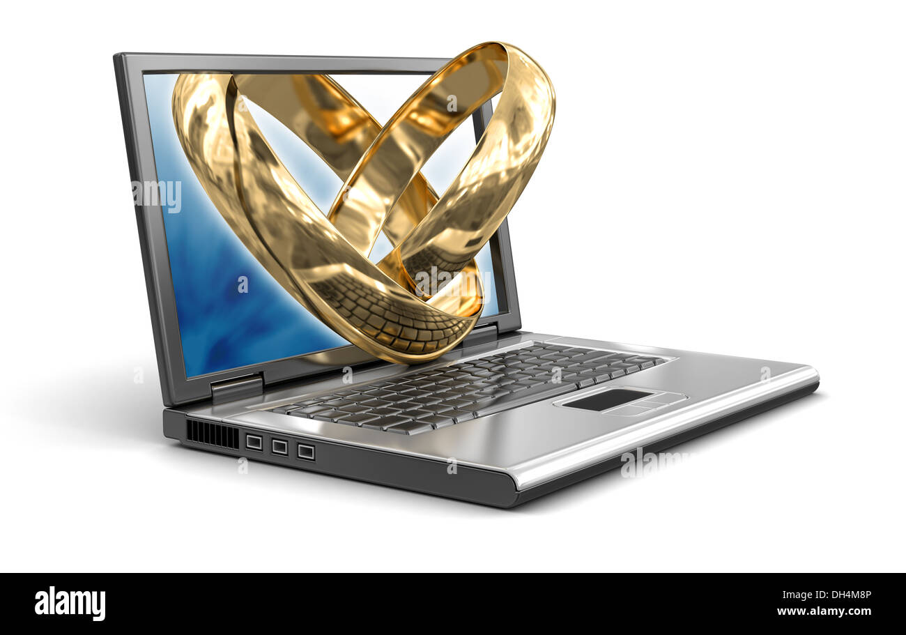 Laptop and Gold rings (clipping path included Stock Photo - Alamy