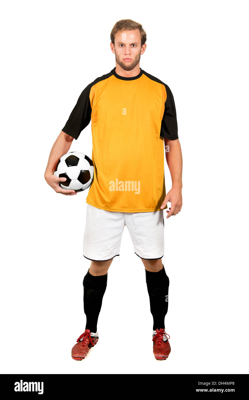 Football player with a ball isolated in white Stock Photo - Alamy