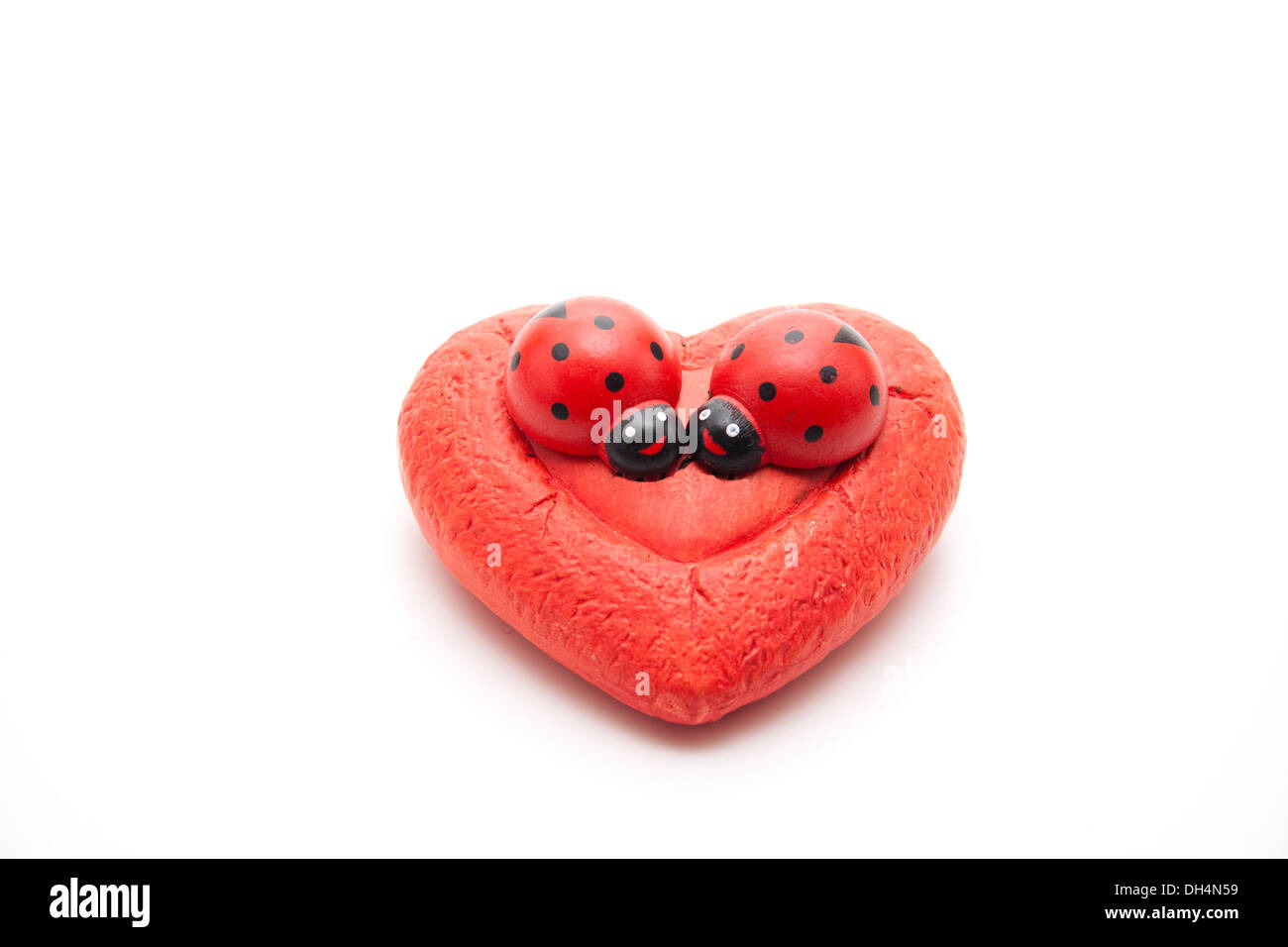Red heart with beetle Stock Photo - Alamy