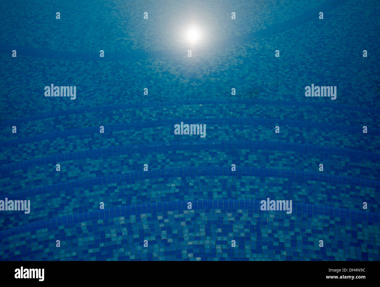 Swimming Pool with sun Stock Photo - Alamy