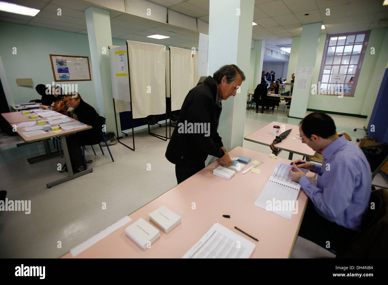 French citizens vote at the Lycee Francais Charles de Gaulle in London ...