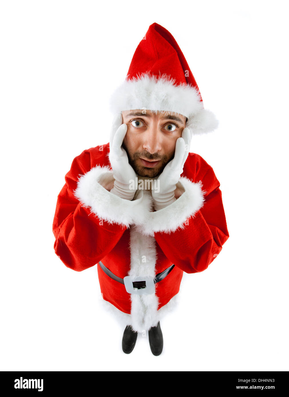 Surprised man as santa claus on white background Stock Photo - Alamy