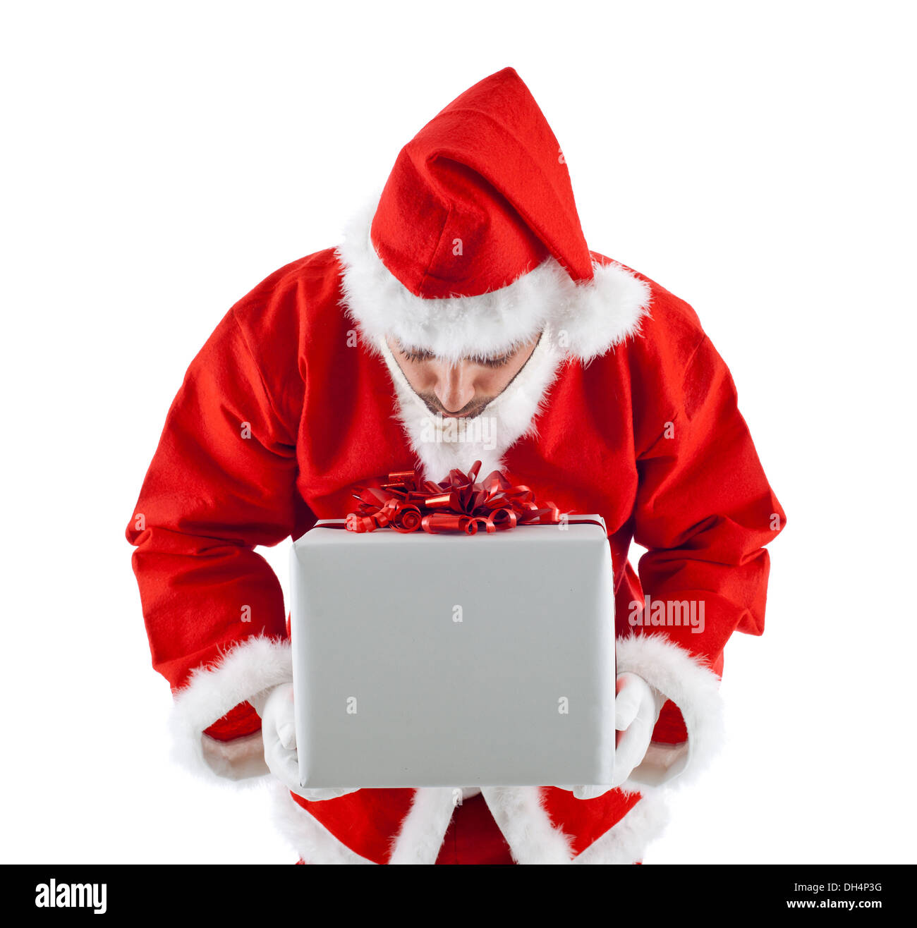 Young Santa Claus with gift box on white background Stock Photo - Alamy