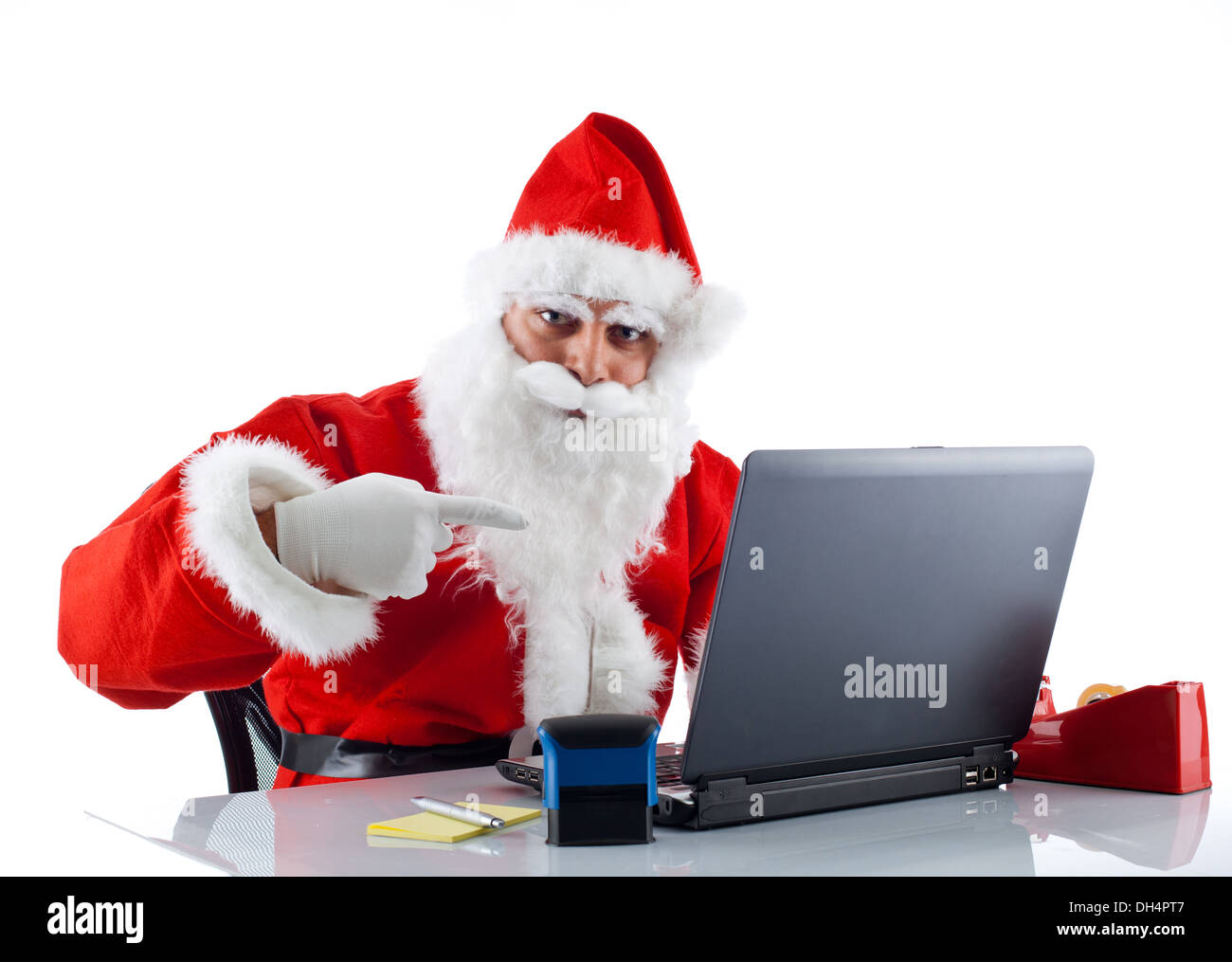 Young Santa Claus with notebook on white background Stock Photo - Alamy