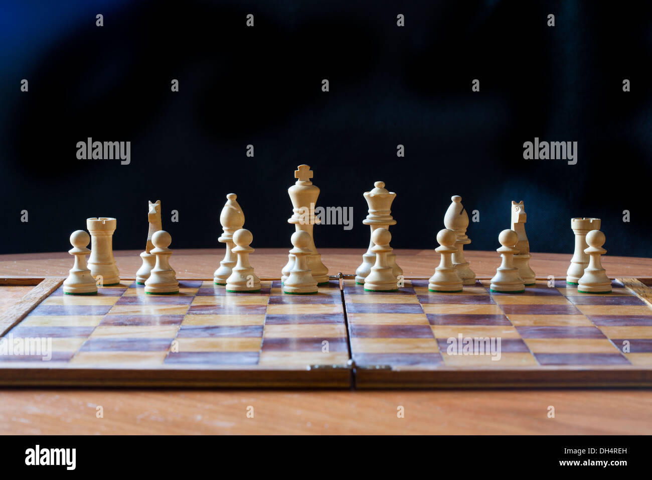 White chess pieces laid out in position on a board Stock Photo - Alamy
