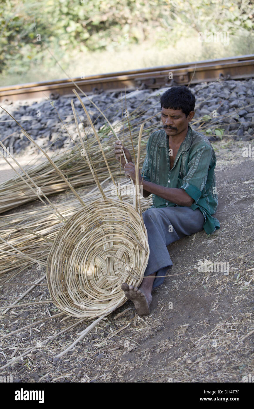 Bhil man making cane baskets, Jhabua, Madhya Pradesh, India Stock Photo ...