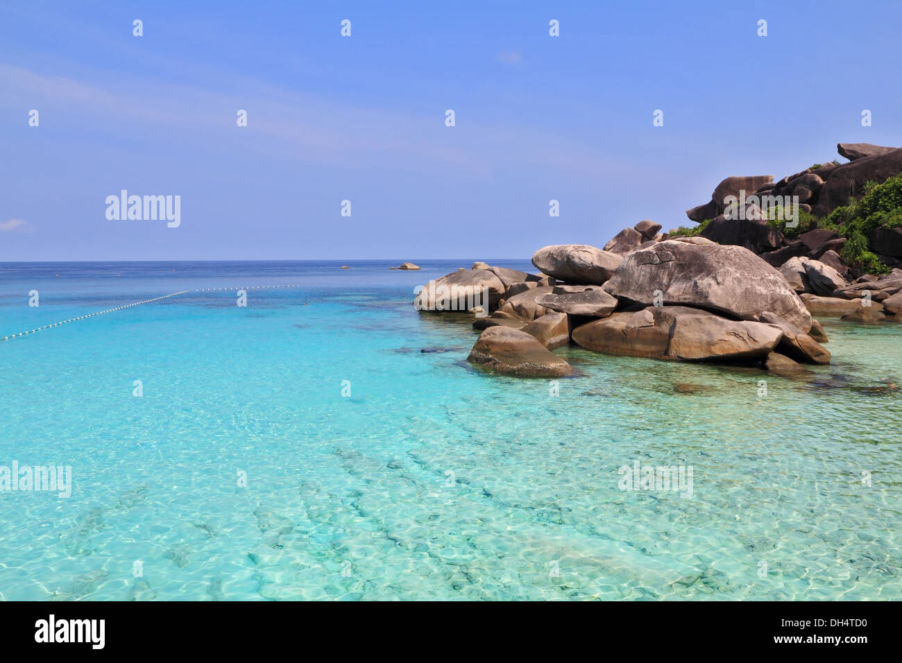 Scenic cliffs and clear azure water Stock Photo - Alamy