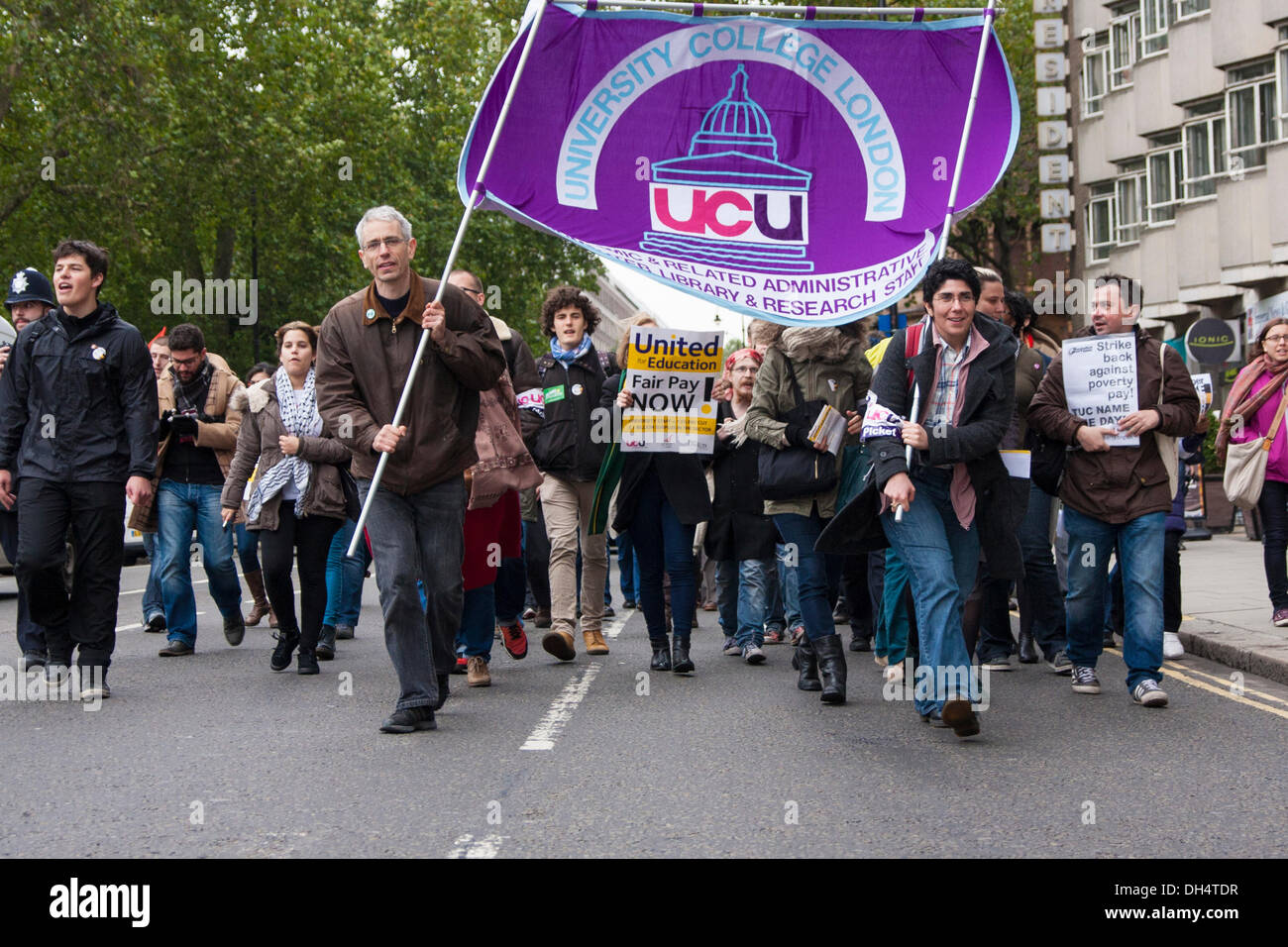 London, UK. 31st October 2013. Protesters march to Red Lion Square in ...