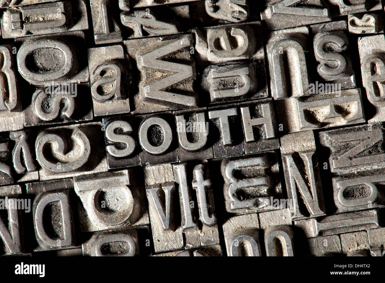 Old lead letters forming the word "SOUTH Stock Photo - Alamy