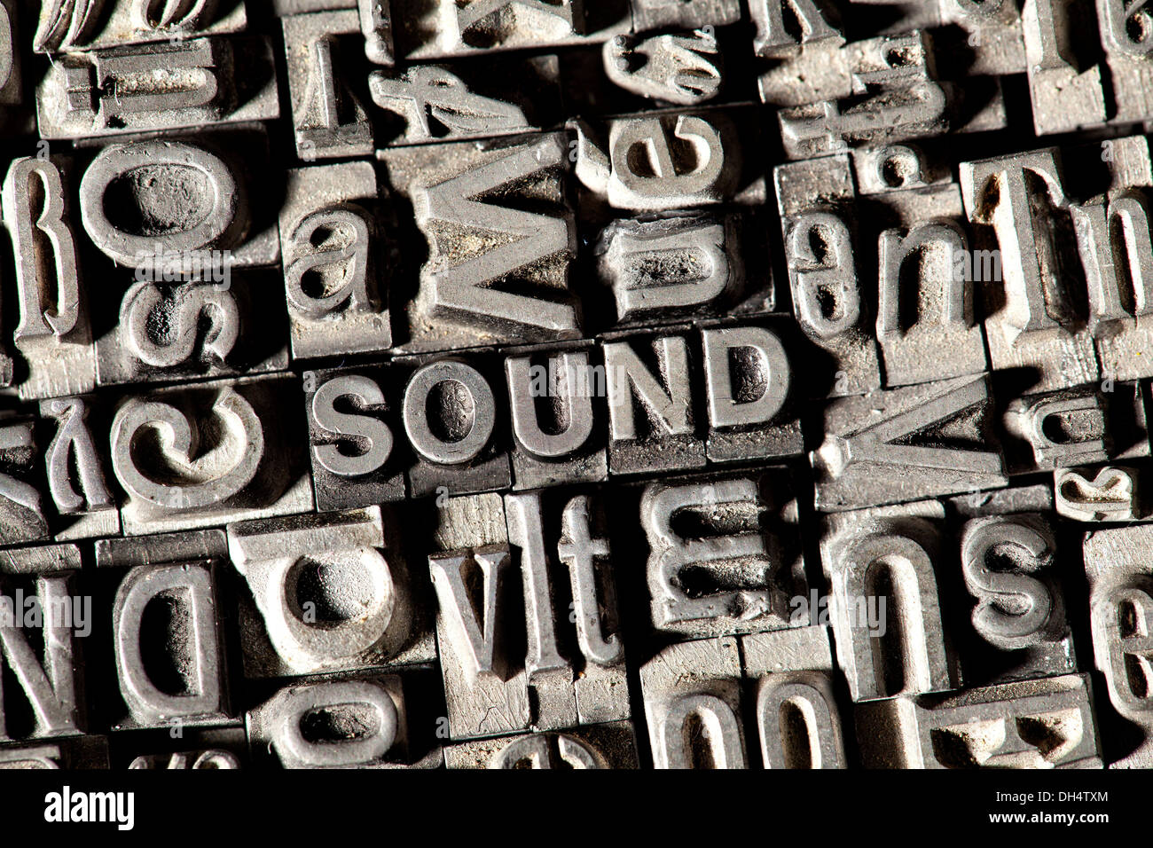 Old lead letters forming the word "SOUND Stock Photo - Alamy