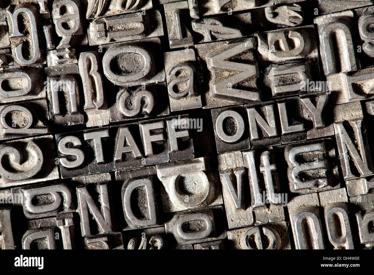 Old lead letters forming the term "STAFF ONLY Stock Photo - Alamy