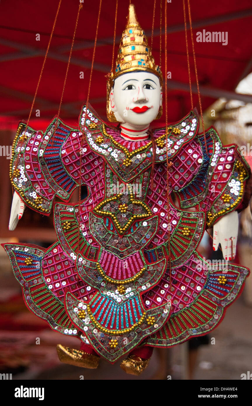 Vertical close up of a highly decorated wooden stringed puppet Stock ...