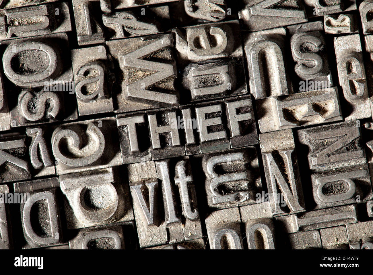Old lead letters forming the word THIEF Stock Photo - Alamy