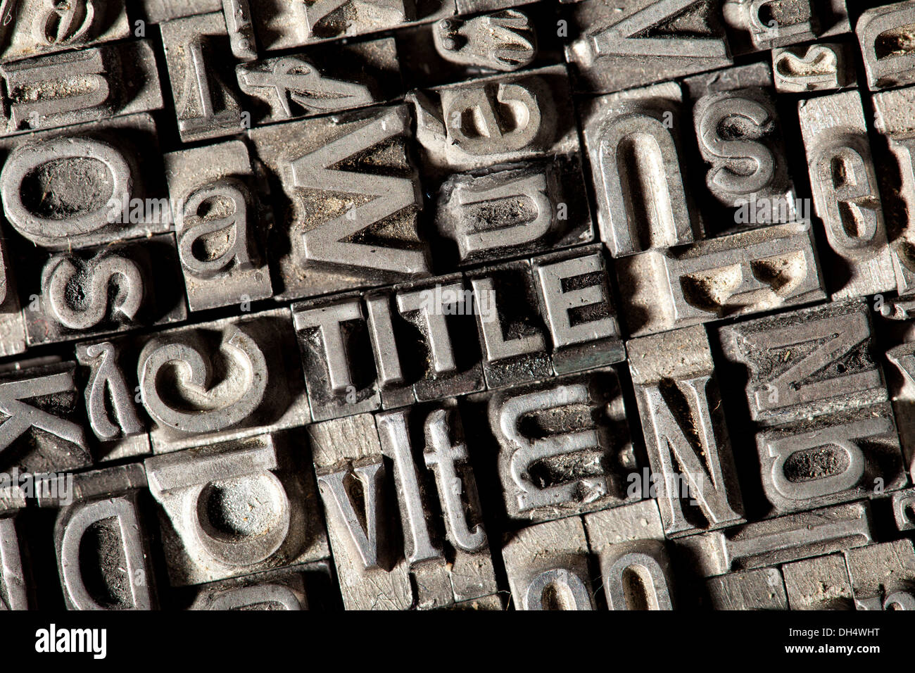 Old lead letters forming the word TITLE Stock Photo - Alamy