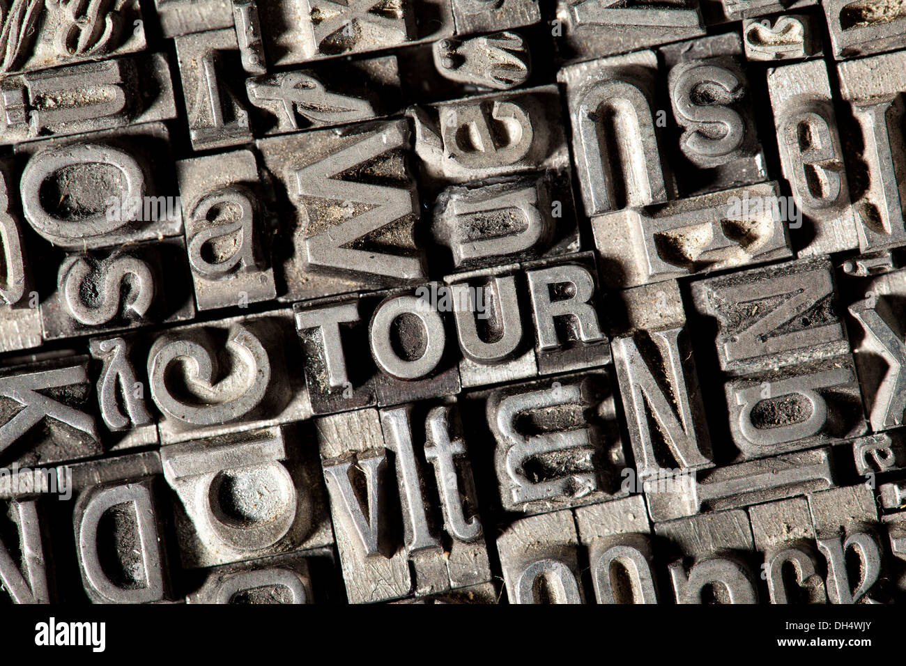 Old lead letters forming the word TOUR Stock Photo - Alamy