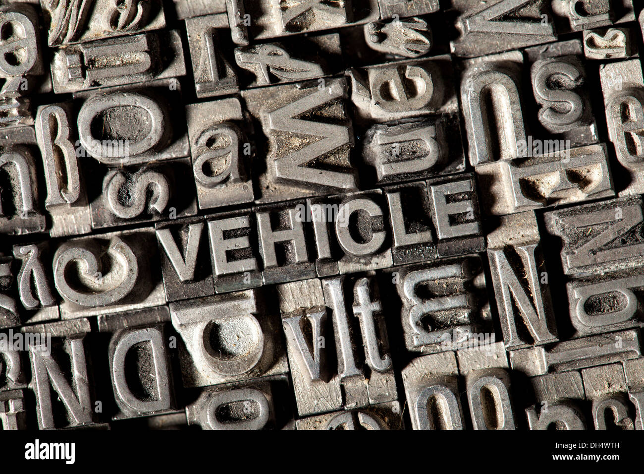 Old lead letters forming the word VEHICLE Stock Photo - Alamy
