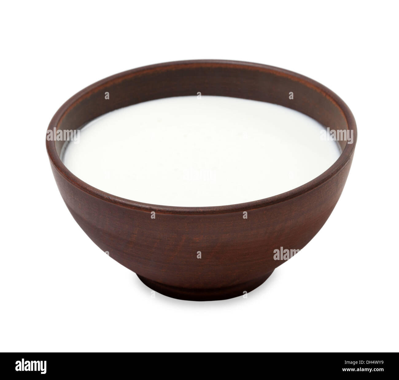 Ceramic bowl with milk on white background Stock Photo - Alamy