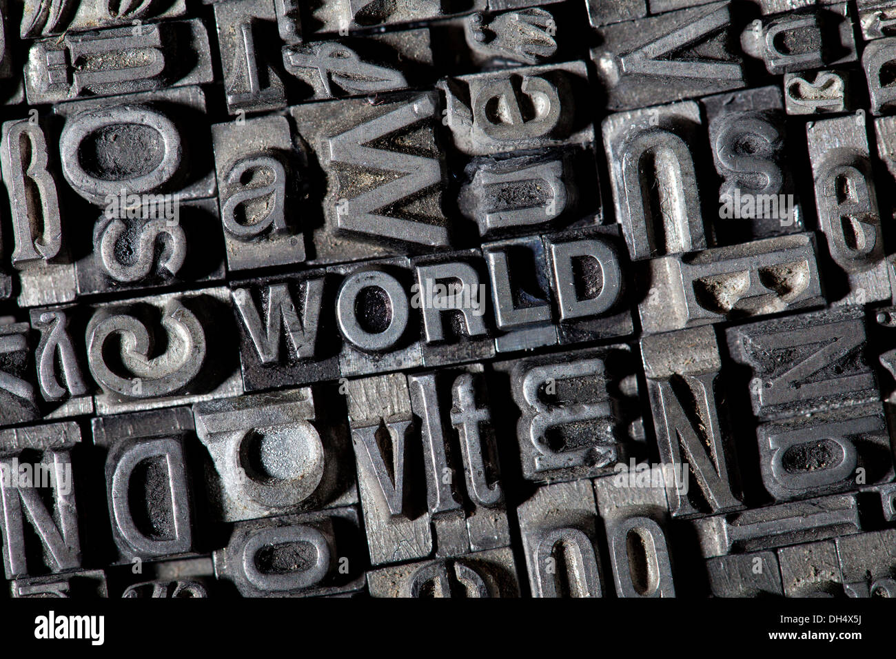Old lead letters forming the word WORLD Stock Photo - Alamy