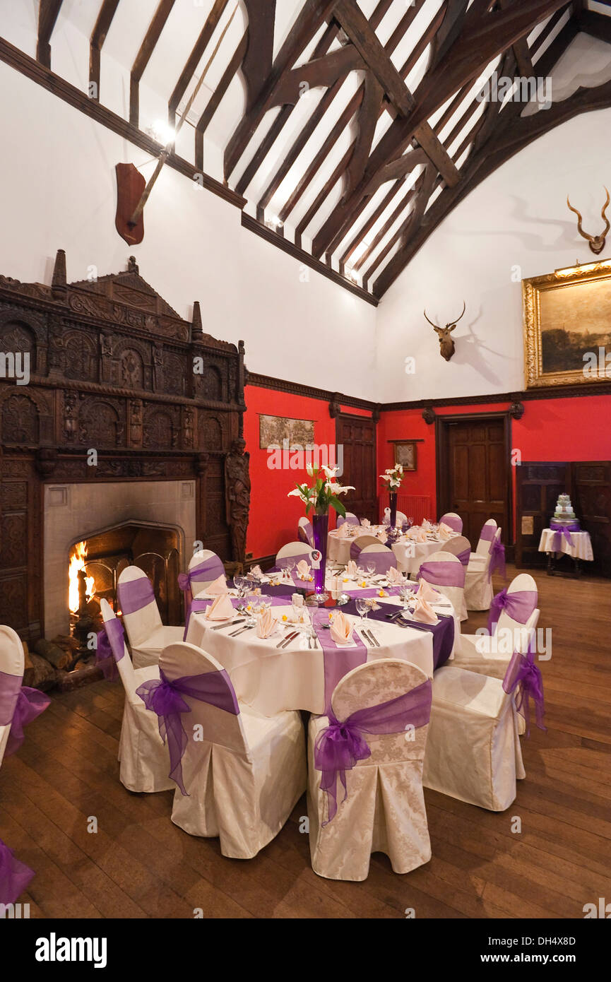 Vertical view of a grand hall in a stately house laid ready for a ...