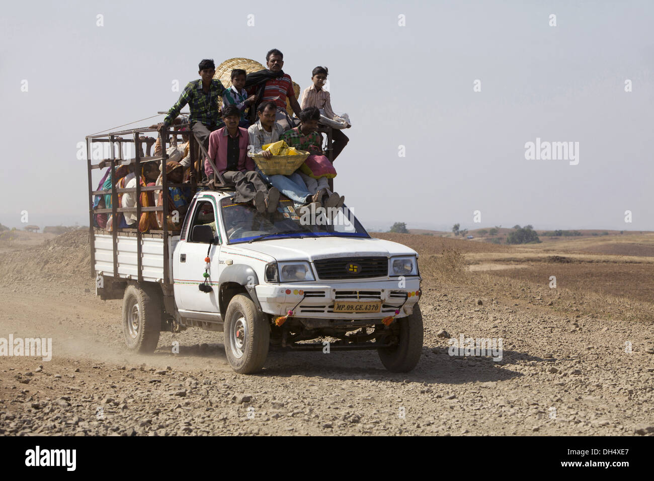 Crowded vehicle with people Stock Photo - Alamy